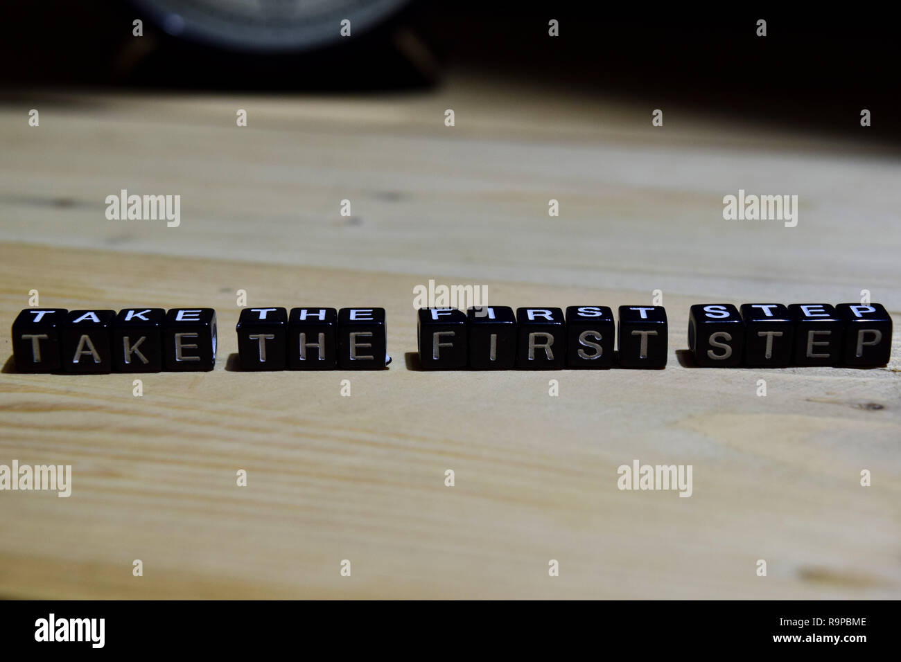 Take the first step written on wooden blocks. Education and business ...