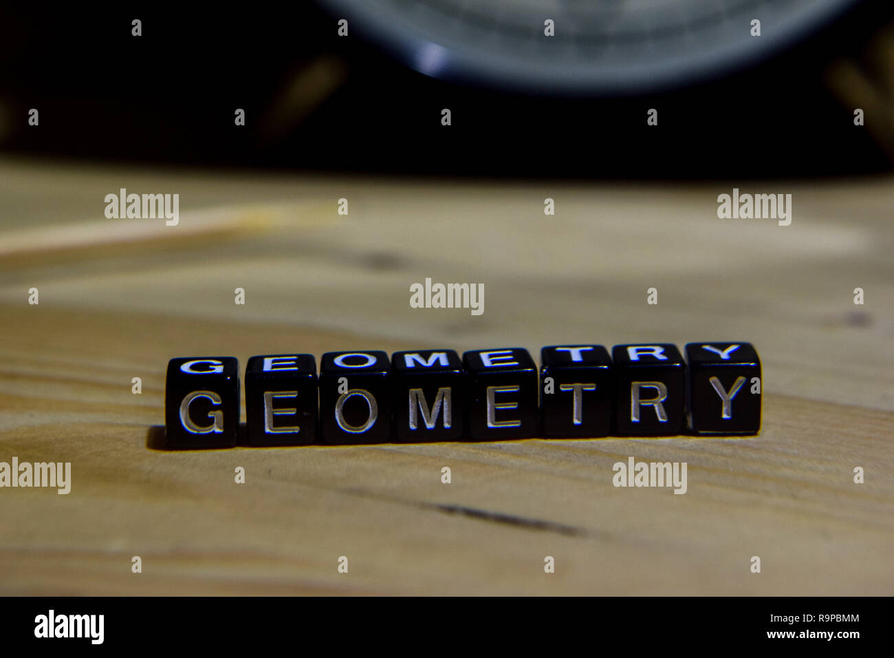 Geometry written on wooden blocks. Education and business concept on ...