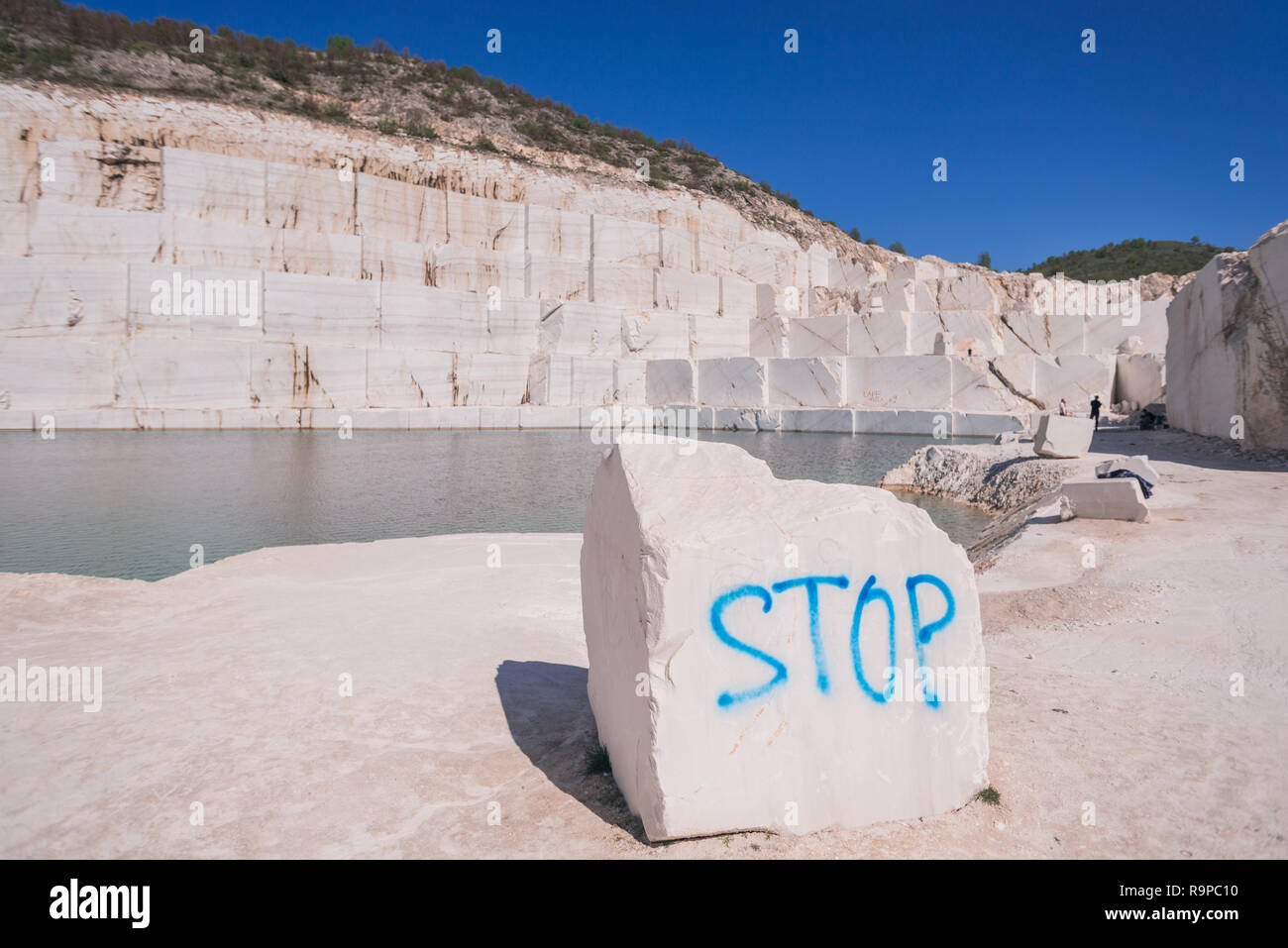stop sign in Quarry of white marble statuary Stock Photo - Alamy