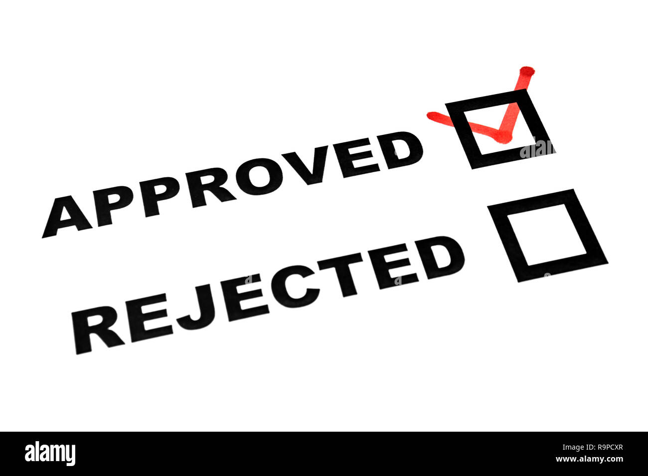 Approved and rejected check boxes on white sheet tick on approved Stock ...