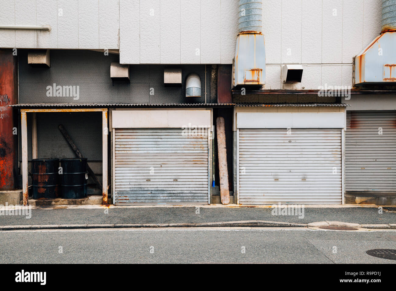 Shutter door closed factory building Stock Photo - Alamy