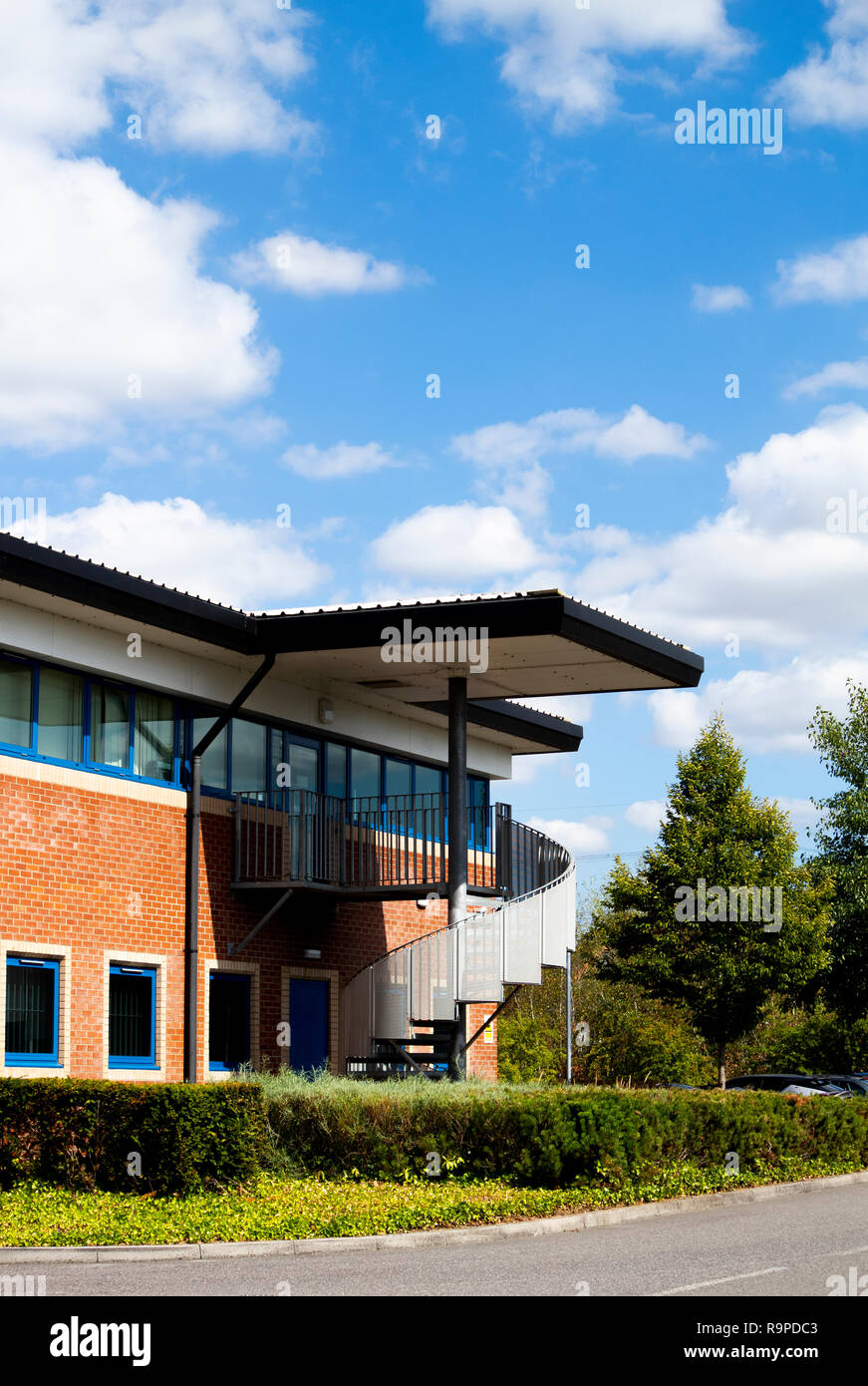 spiral steel emergency exit fire escape to side of office building ...