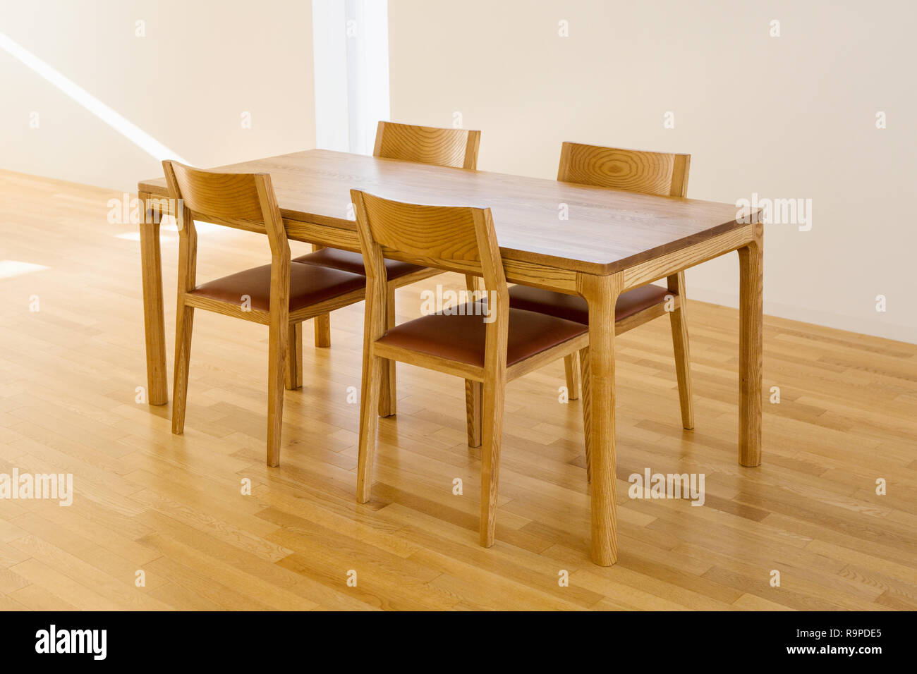 wooden table and chair Stock Photo - Alamy