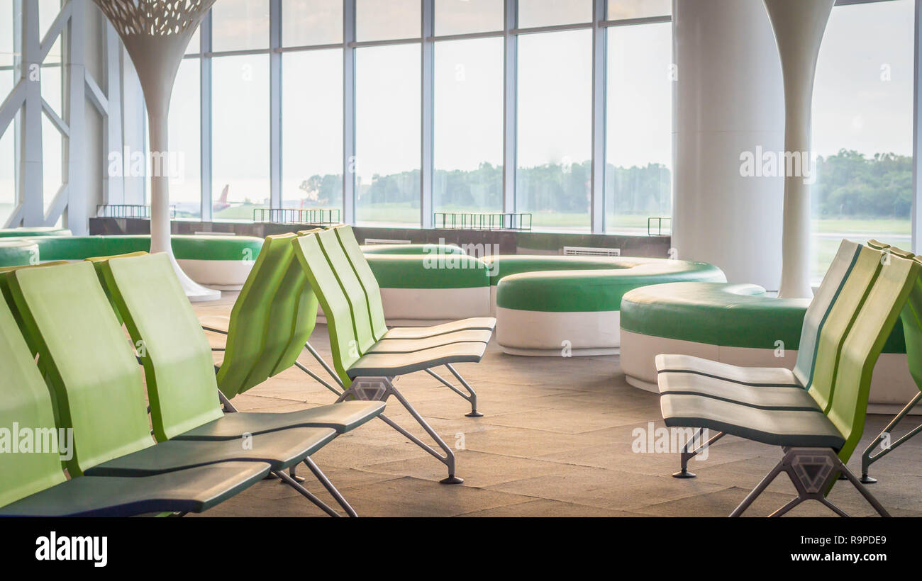 bench inside airport terminal building. travel and aviation industry ...
