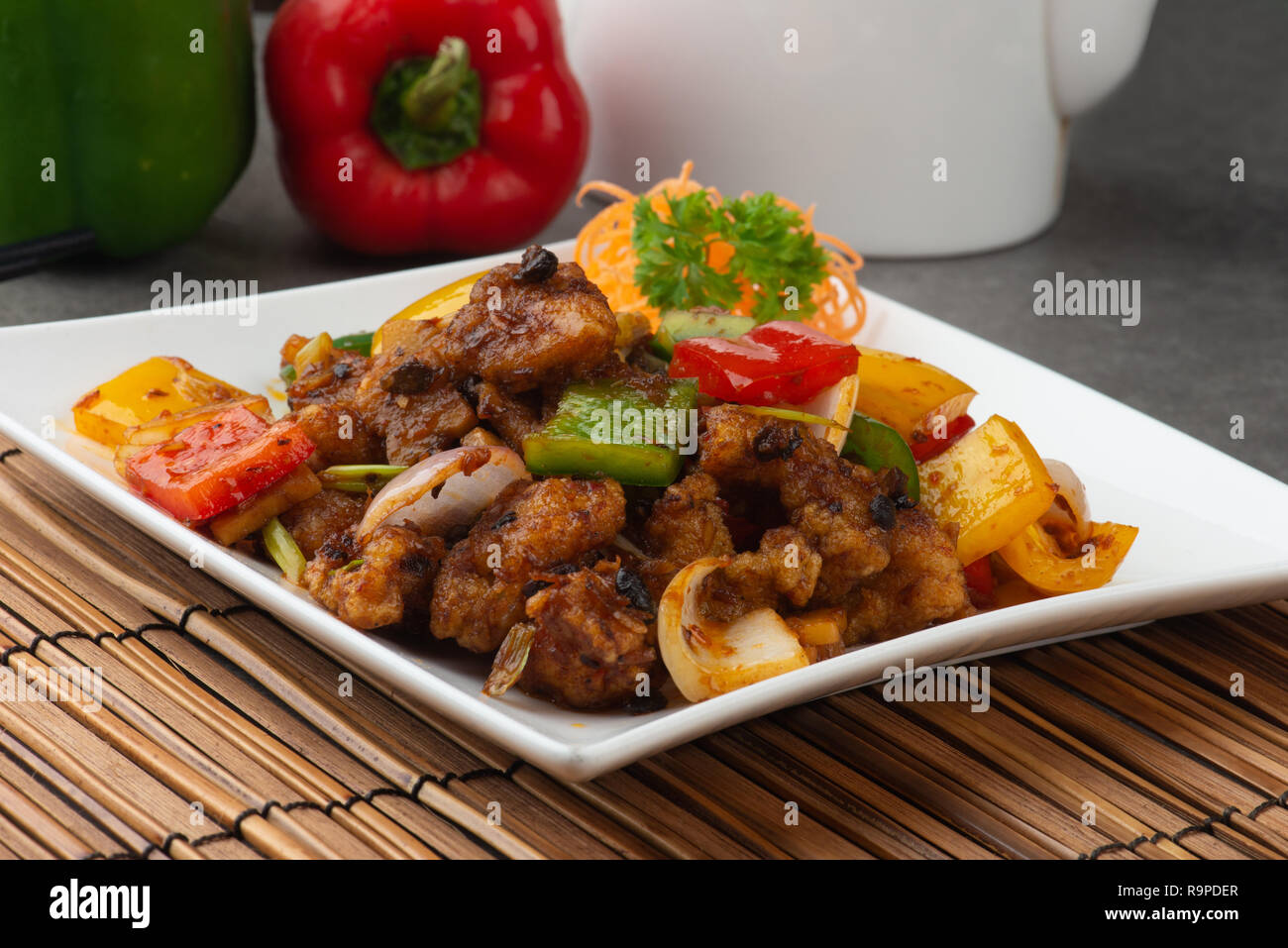 stir-fried chinese style grouper fish fillet with herbs and black ...