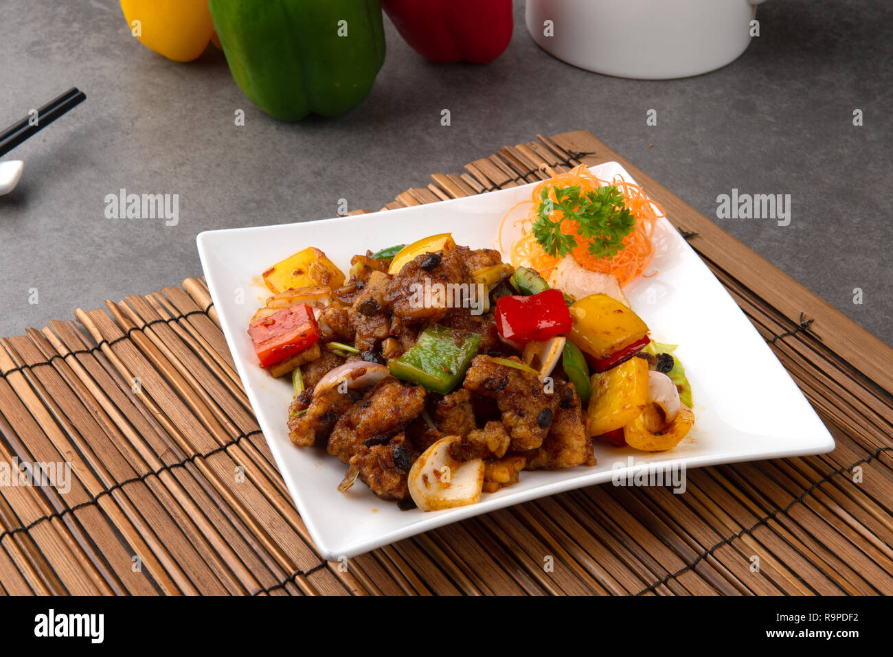 stir-fried chinese style grouper fish fillet with herbs and black ...