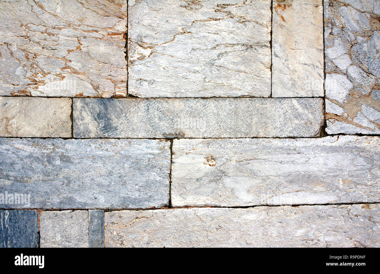 Ancient wall of marble blocks Stock Photo - Alamy