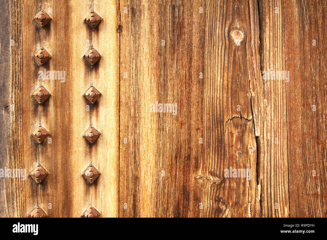 Texture of ancient wood with rivets Stock Photo - Alamy