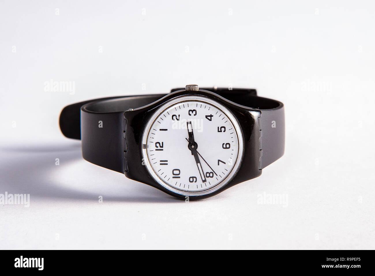 a plastic black watch Stock Photo - Alamy