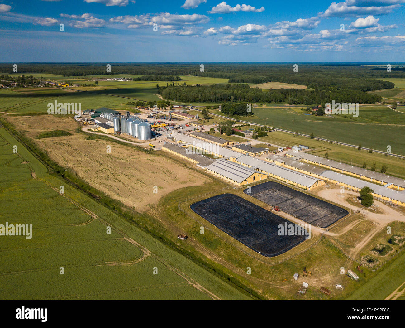Green field. Agricultural , factory aerial view Stock Photo - Alamy