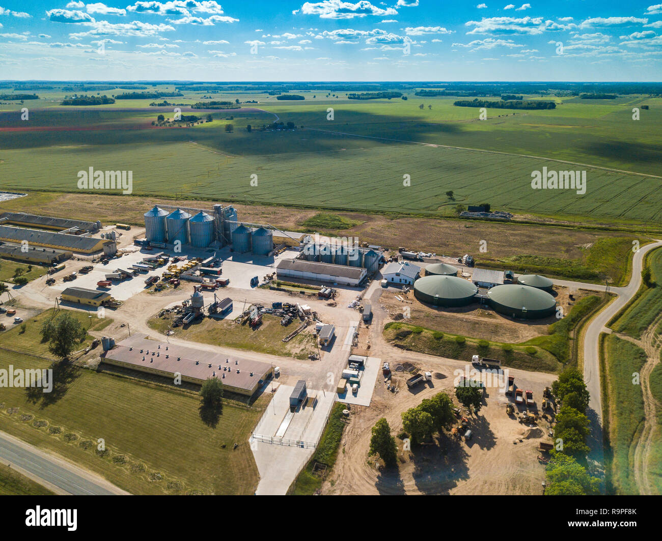 Green field. Agricultural , factory aerial view Stock Photo - Alamy