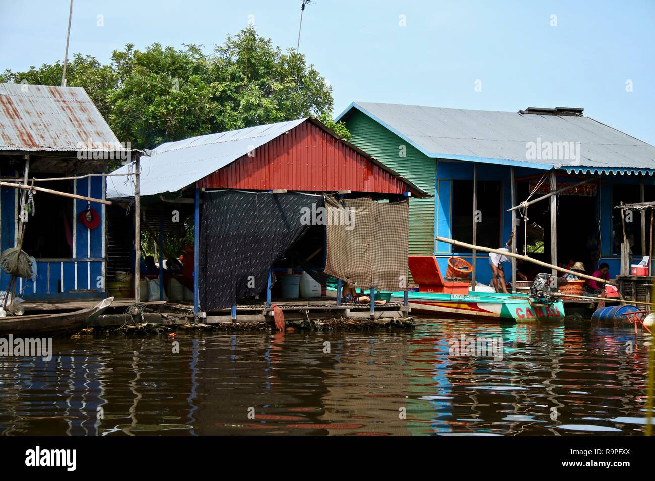 Floating homes at a floating village in Asia Stock Photo - Alamy