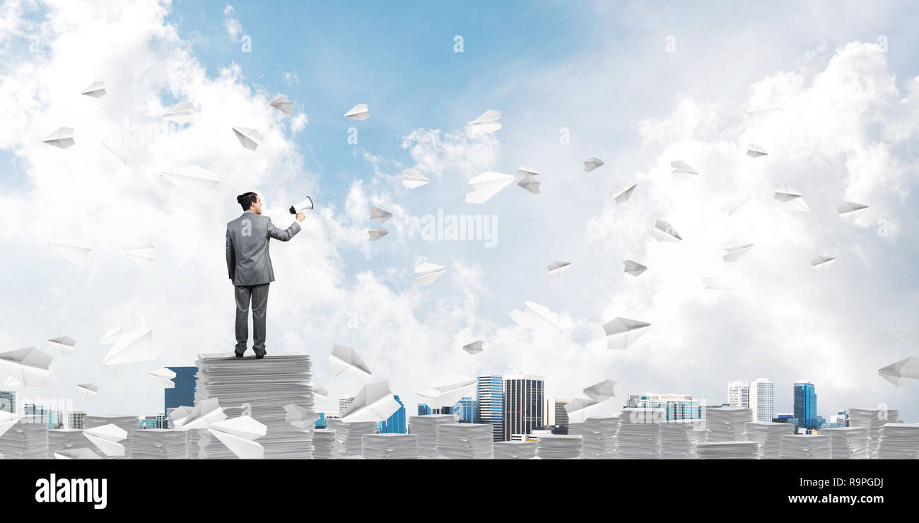 Businessman standing with megaphone Stock Photo - Alamy Businessman standing with megaphone Stock Photo - Alamy