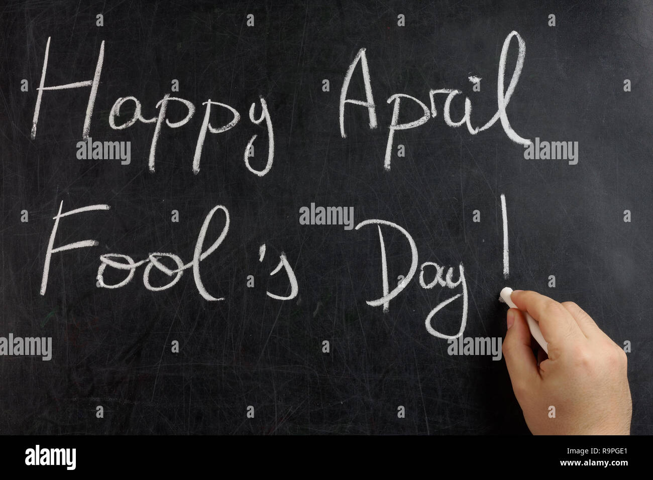Hand writing Happy April fool s day on blackboard or chalkboard Stock ...