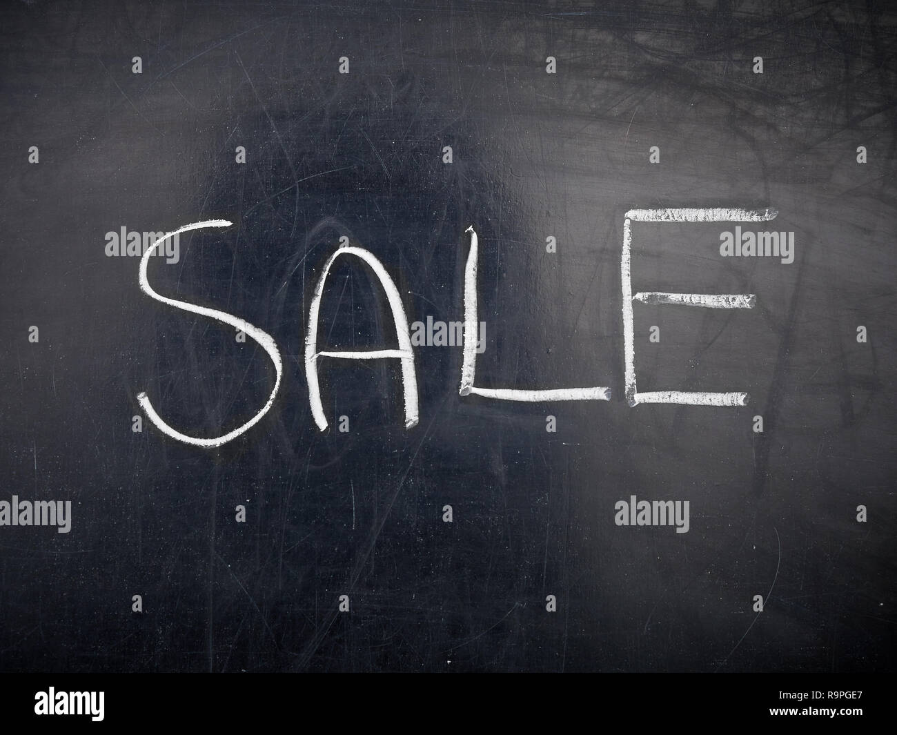 Handwritten Sale on blackboard or chalkboard Stock Photo - Alamy