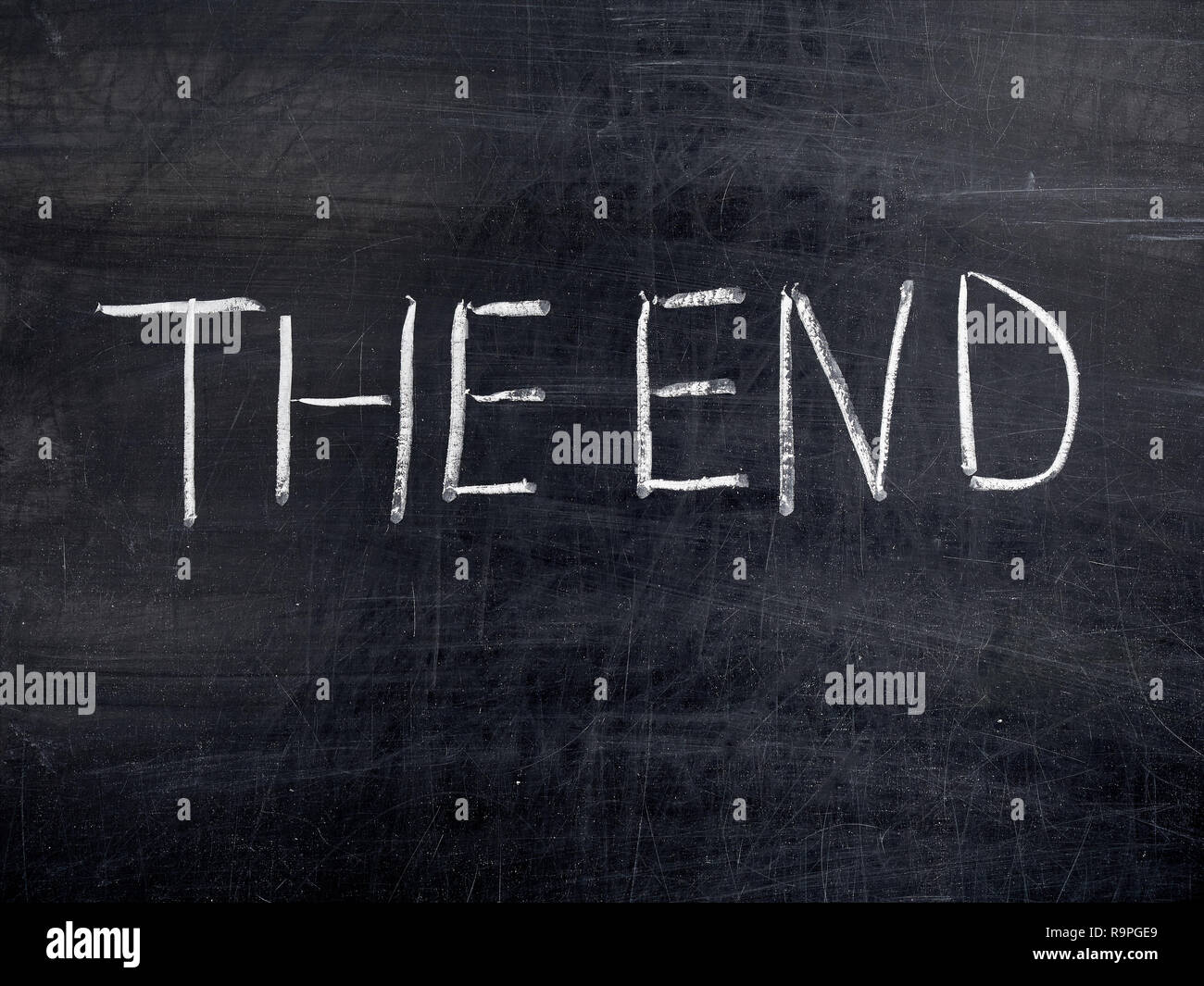 Handwritten the end text on blackboard or chalkboard Stock Photo - Alamy