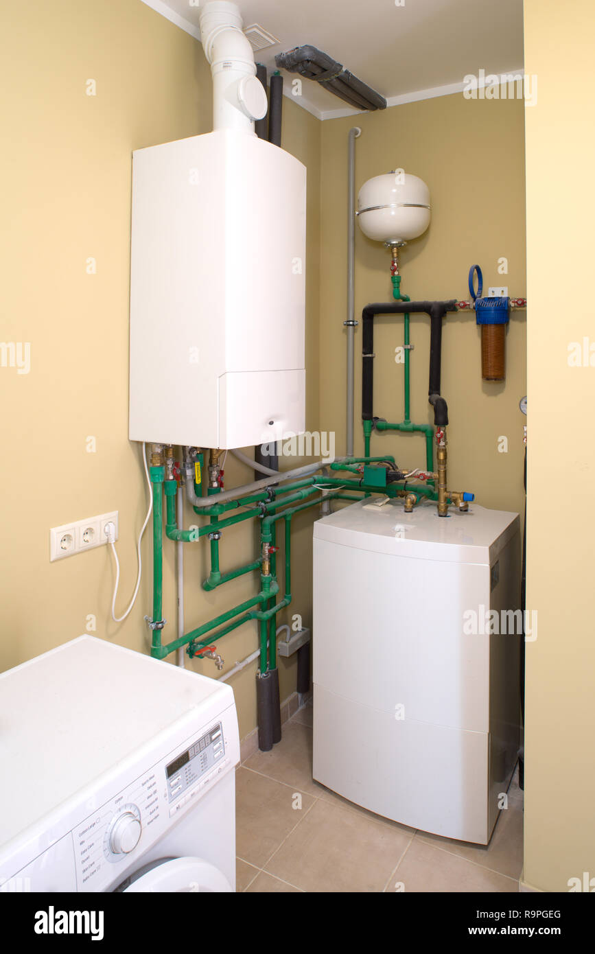 Modern house. Domestic boiler Stock Photo - Alamy