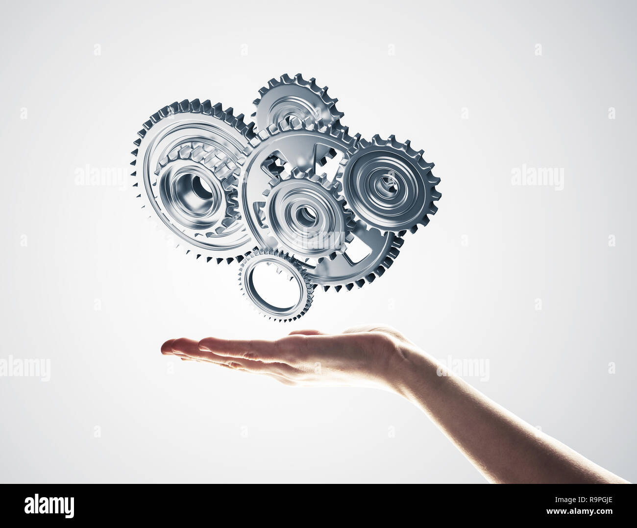 Concept of teamwork and cooperation presented with working gear Stock ...