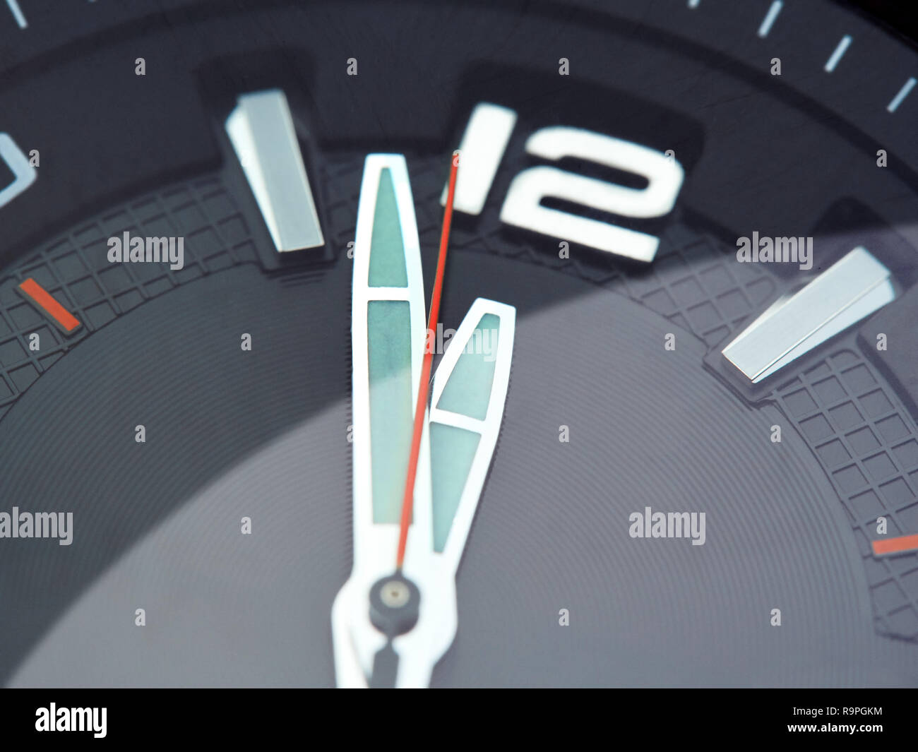 Close up clock almost twelve countdown Stock Photo - Alamy