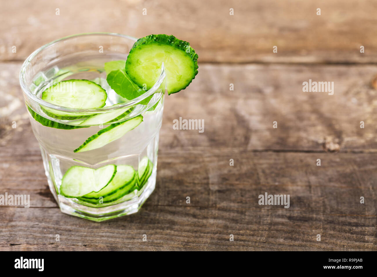A cup of cucumber water. Handmade Stock Photo - Alamy