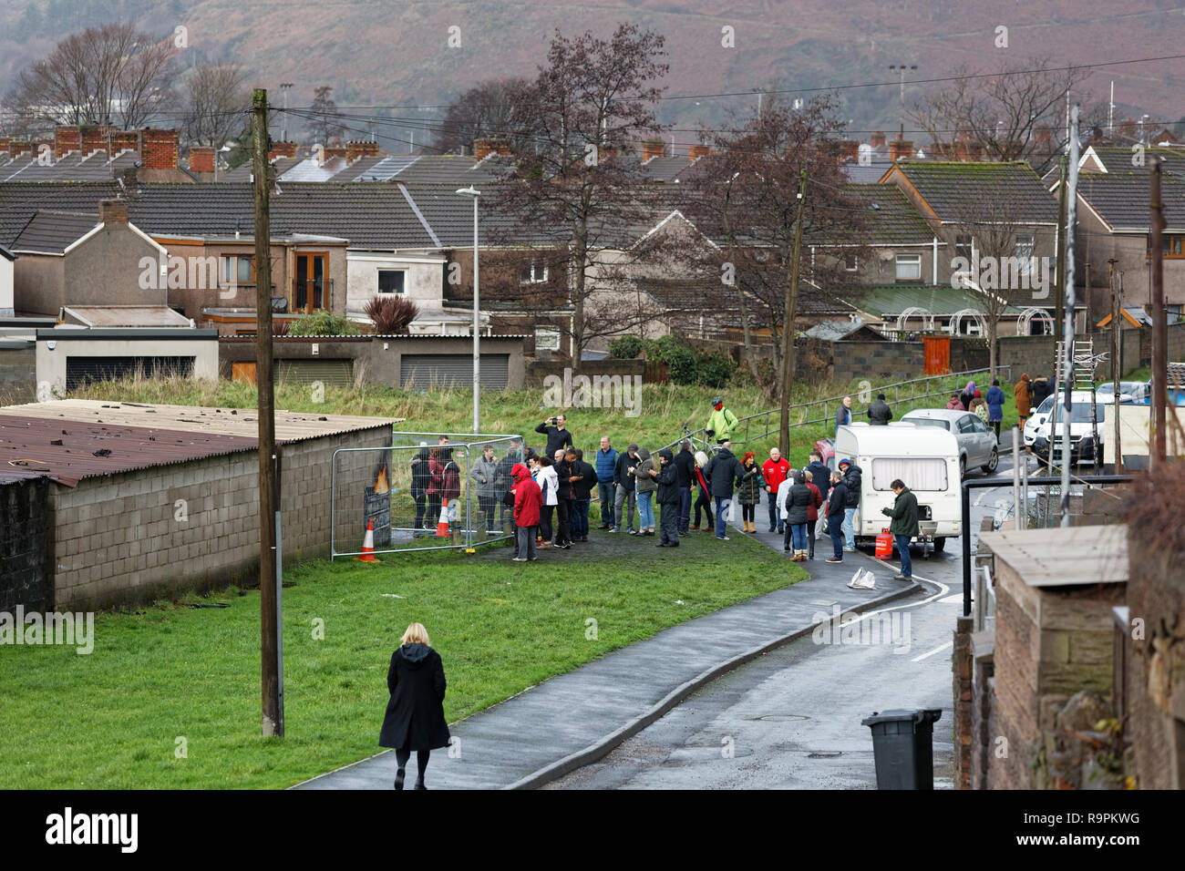 Pictured: Crowds arrive to see and take pictures of the Banksy graffiti ...