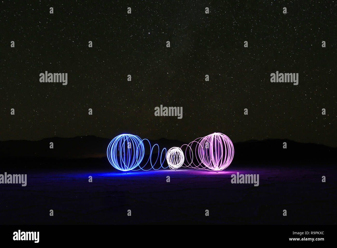 Three Orbs in the Death Valley Salt Flats With the Milky Way Stars ...