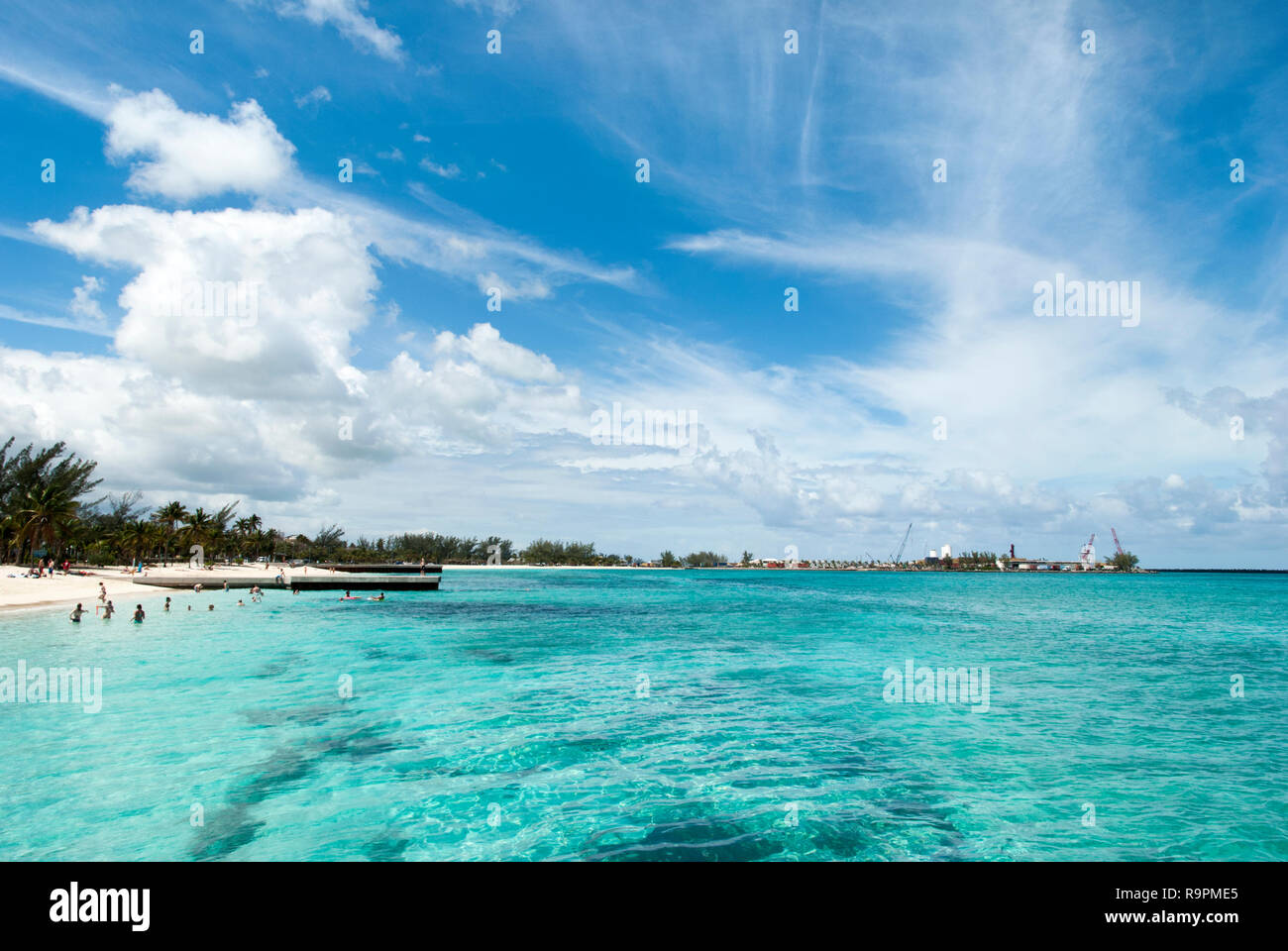 The crystal clear waters and the blue sky over the beach in Nassau, the ...