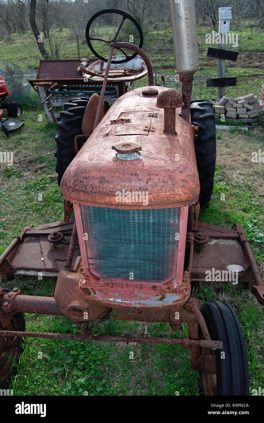 Old rusty red iron farmer's tractor Stock Photo - Alamy