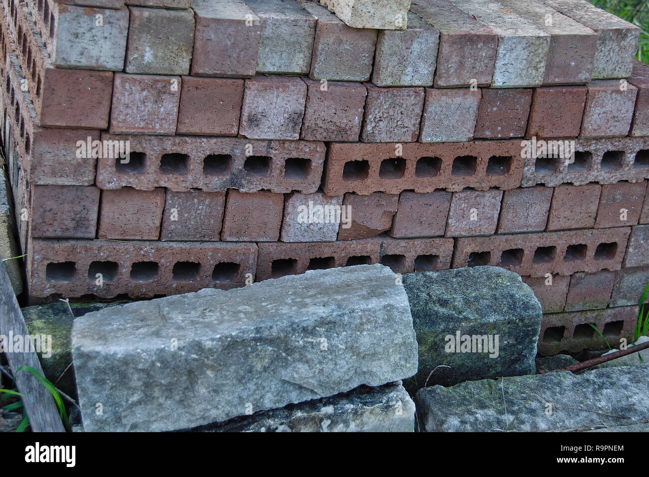 A stack of bricks and cement pavers Stock Photo - Alamy