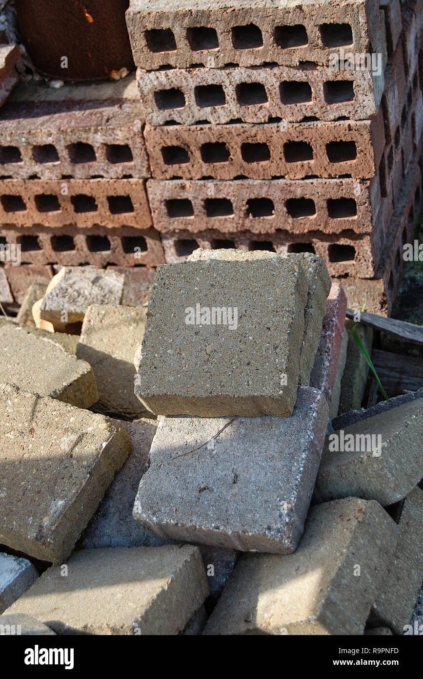 A stack of bricks and cement pavers Stock Photo - Alamy