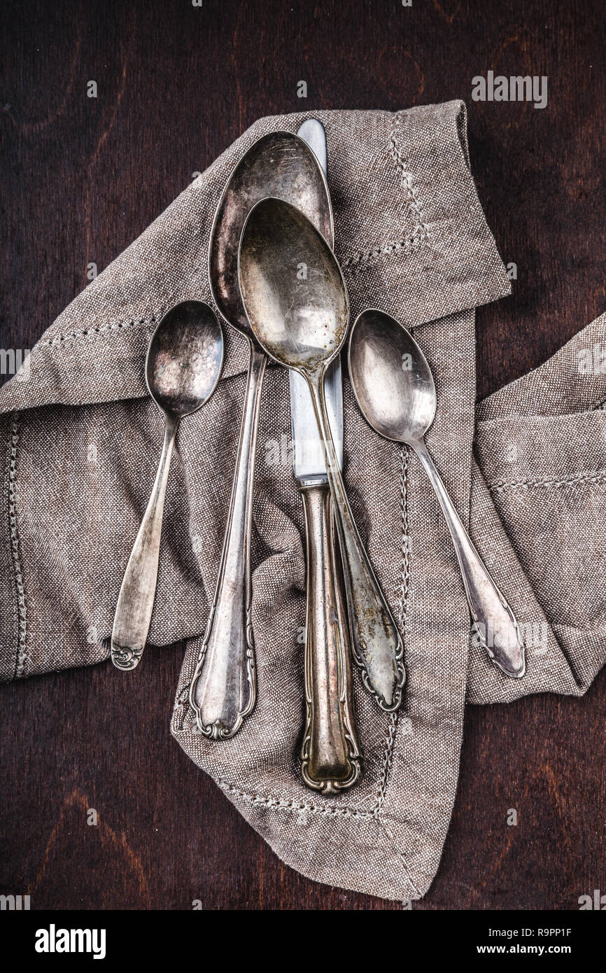 old cutlery, different kinds, on a cloth, top view Stock Photo - Alamy