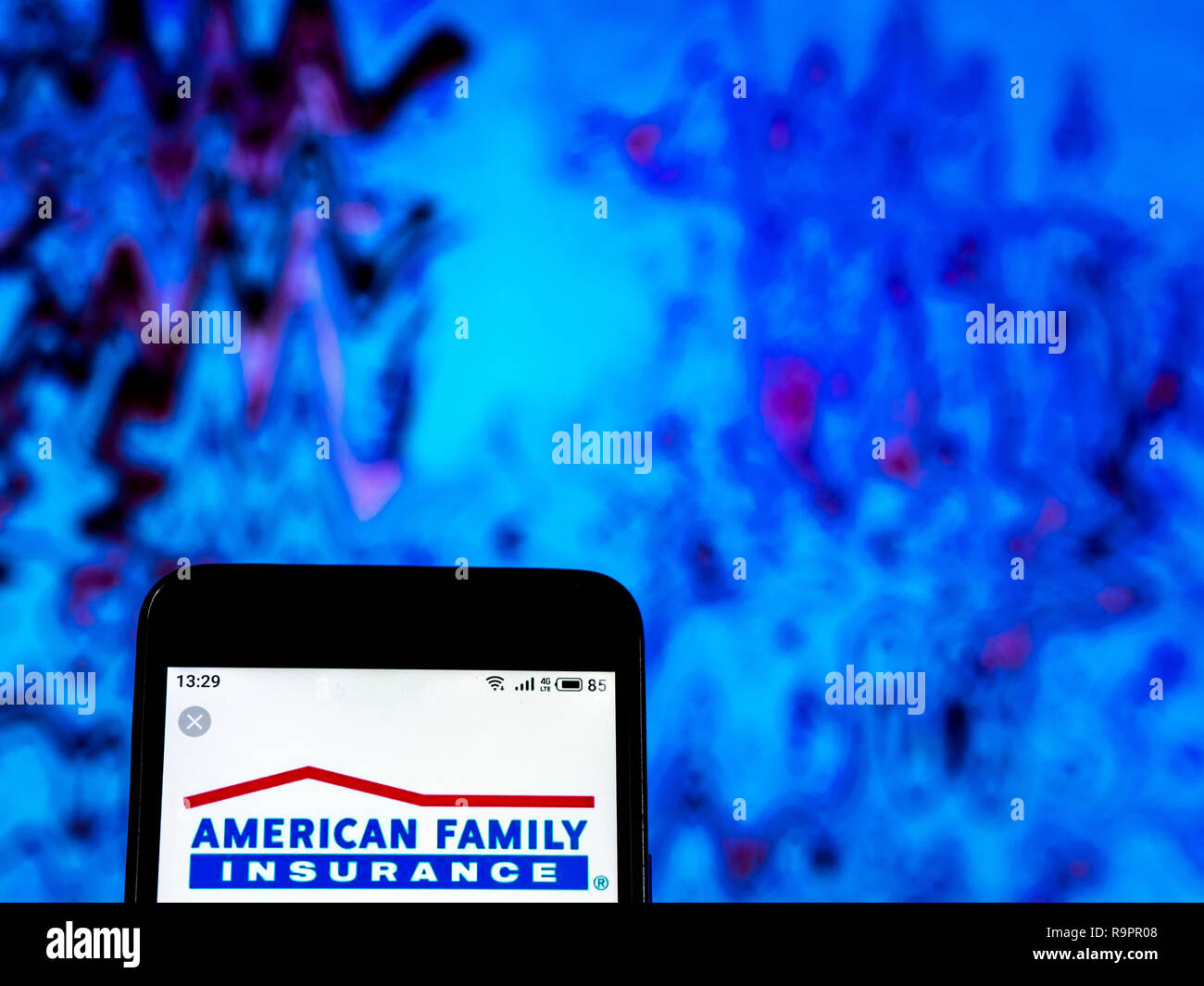 American Family Insurance company logo seen displayed on smart phone ...