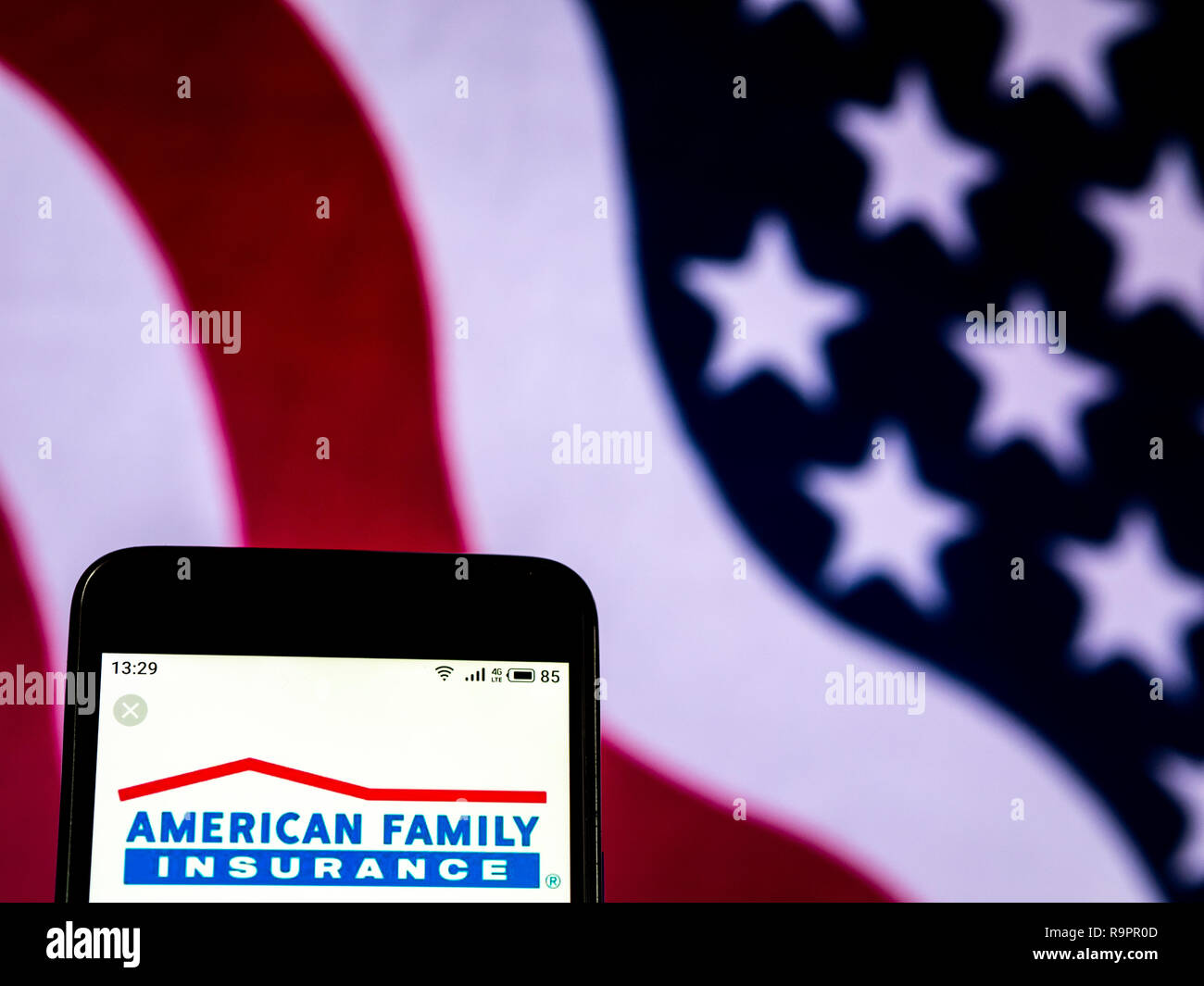 American Family Insurance company logo seen displayed on smart phone ...