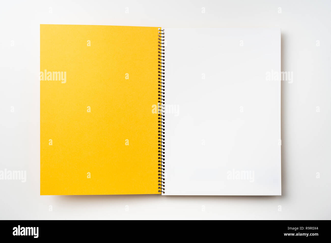 Design concept - Top view yellow spiral notebook with open & flip curl ...
