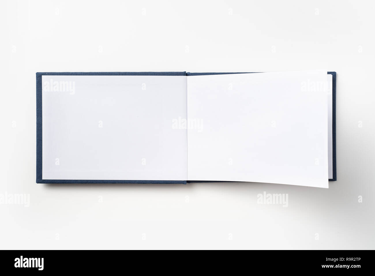 Design concept - Top view blue hardcover notebook with open & flip curl ...