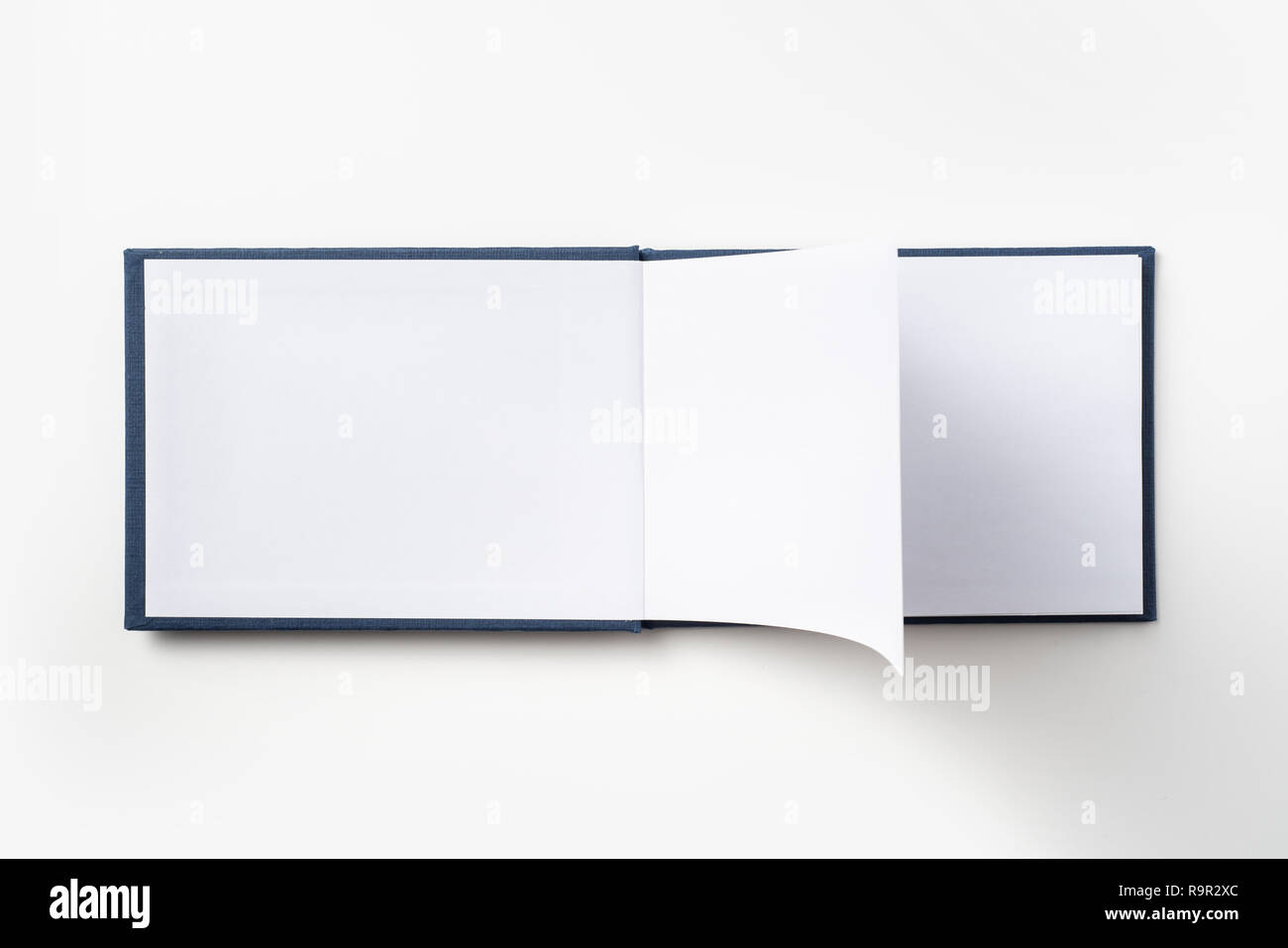 Design concept - Top view blue hardcover notebook with open & flip curl ...