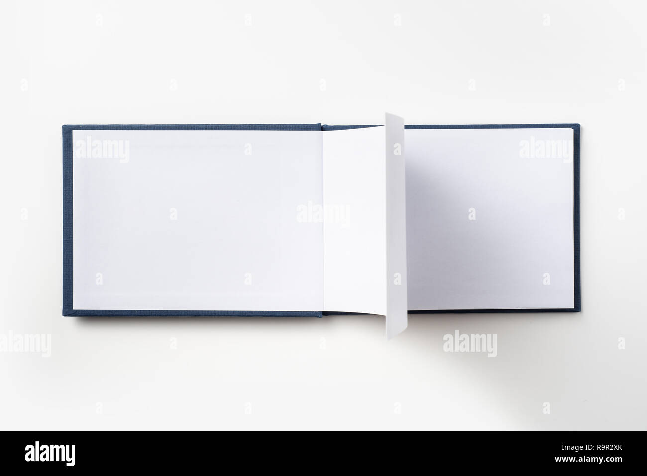 Design concept - Top view blue hardcover notebook with open & flip curl ...