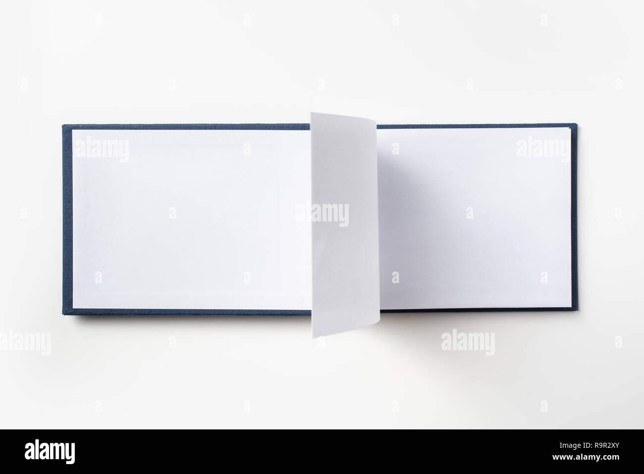 Design concept - Top view blue hardcover notebook with open & flip curl ...