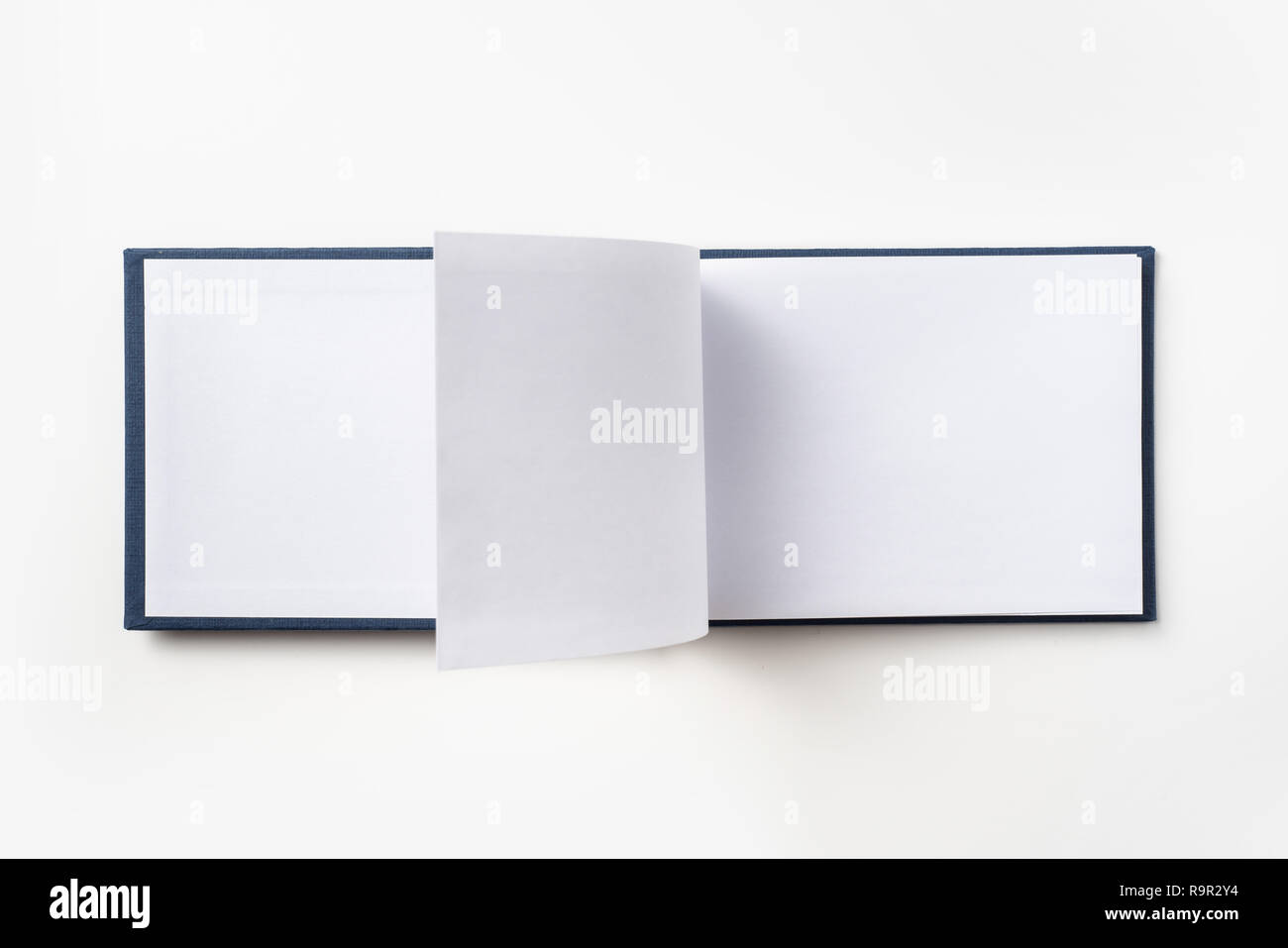 Design concept - Top view blue hardcover notebook with open & flip curl ...