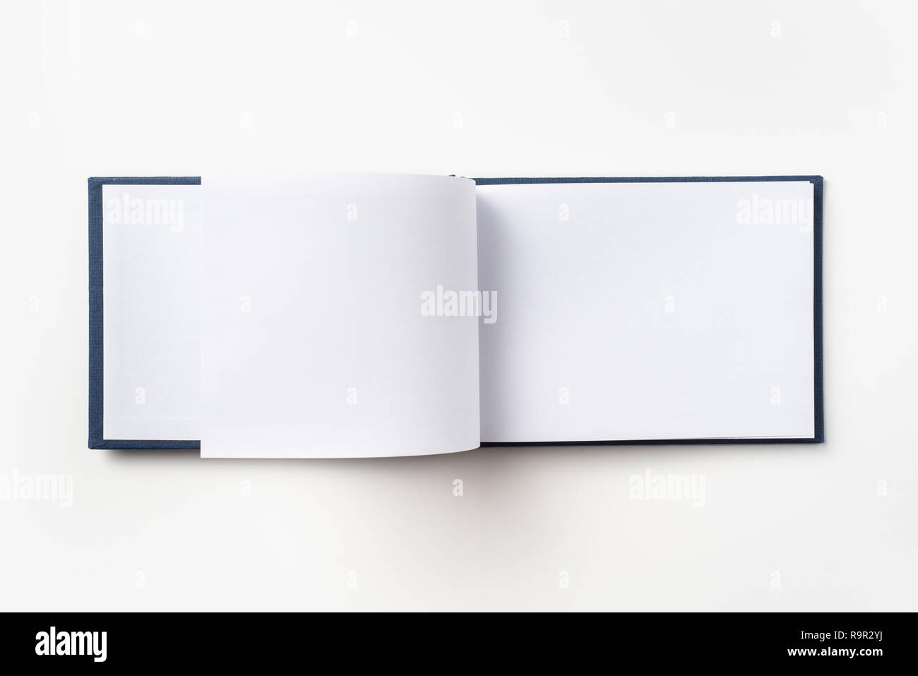 Design concept - Top view blue hardcover notebook with open & flip curl ...