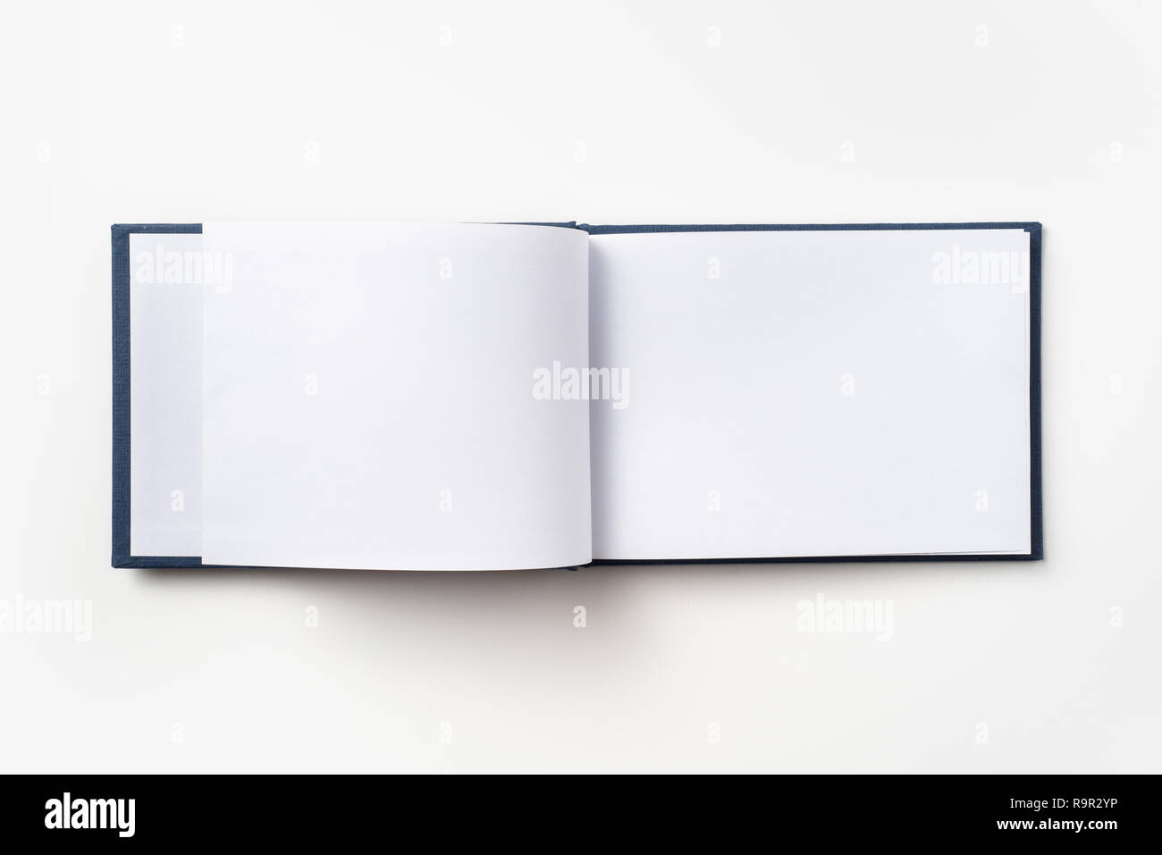 Design concept - Top view blue hardcover notebook with open & flip curl ...