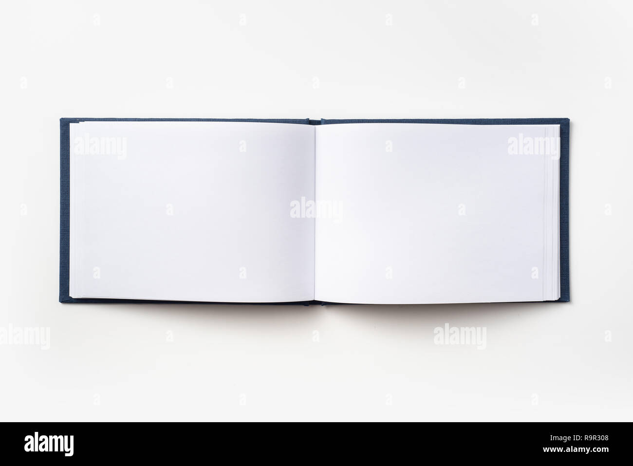 Design concept - Top view blue hardcover notebook with open & flip curl ...
