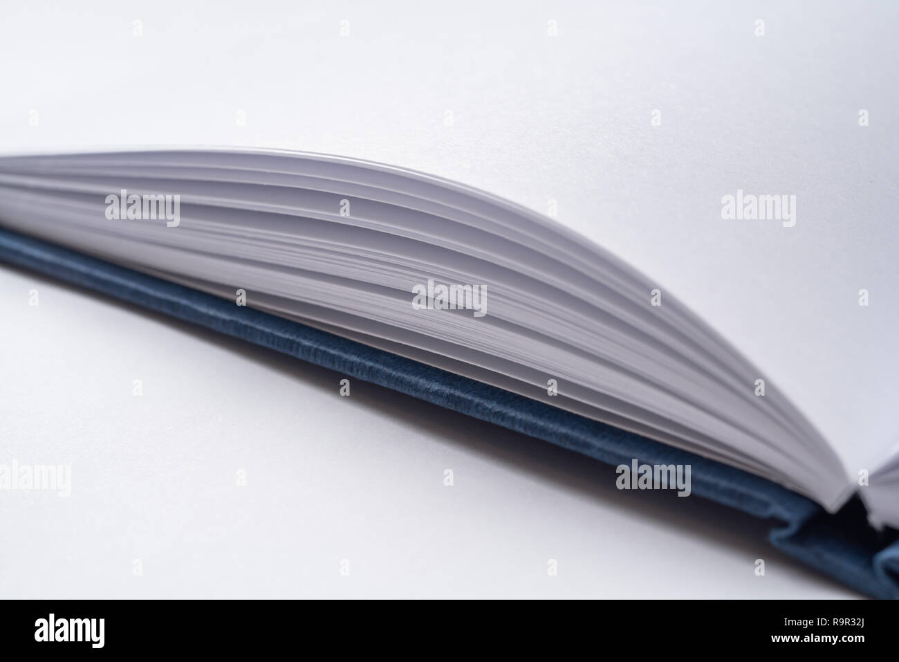 Design concept - Perspective view blue hardcover notebook with open ...