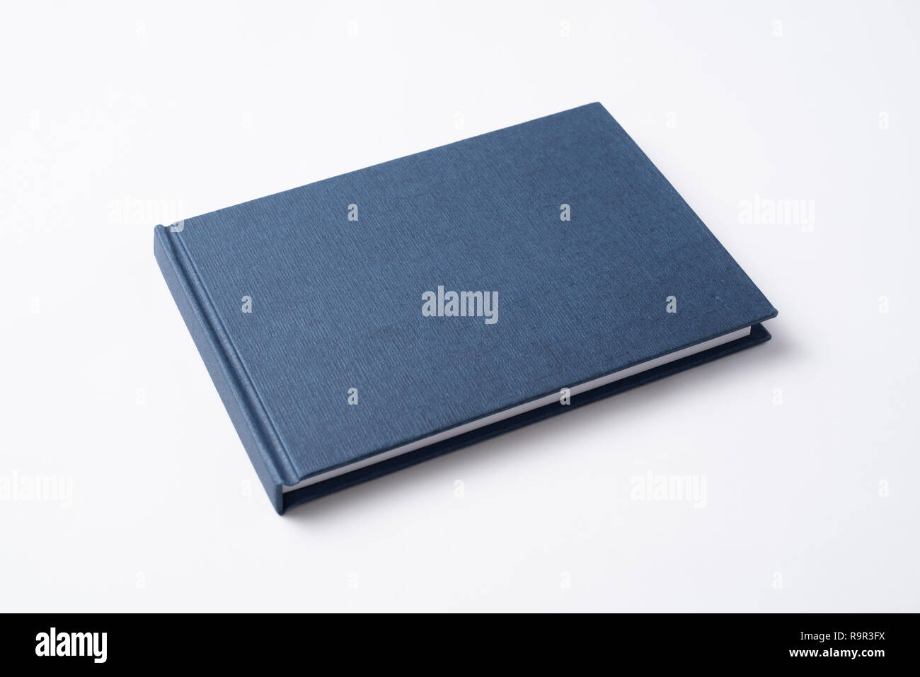 Design concept - Top view blue hardcover notebook with open & flip curl ...