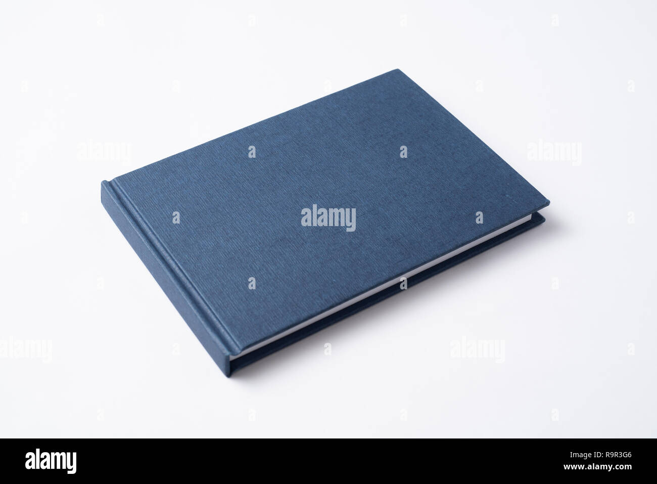 Design concept - Top view blue hardcover notebook with open & flip curl ...