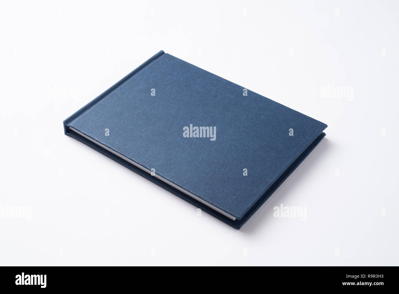 Design concept - Top view blue hardcover notebook with open & flip curl ...