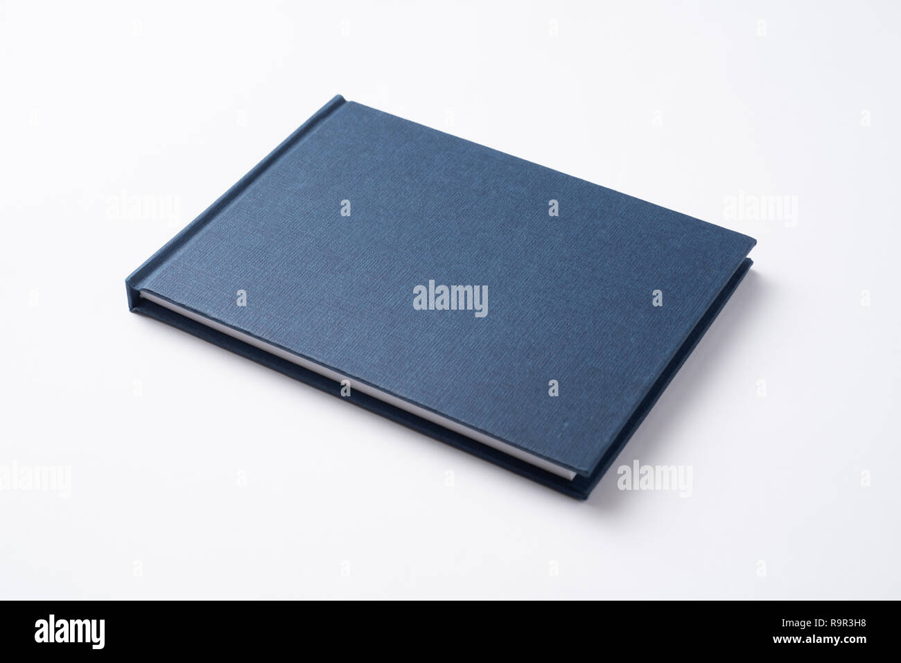 Design concept - Top view blue hardcover notebook with open & flip curl ...