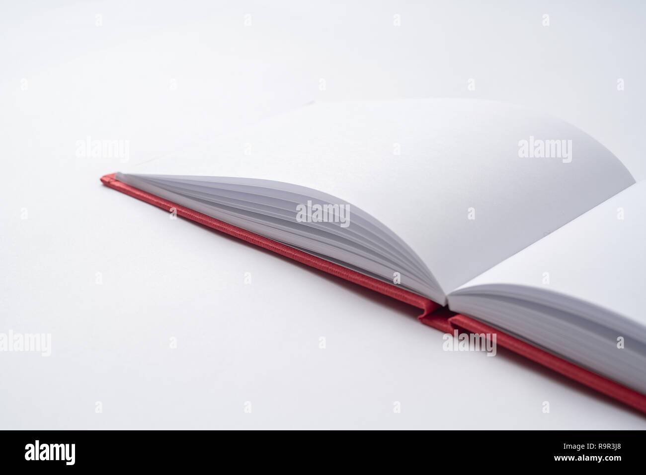 Design concept - Perspective view red hardcover notebook with open ...