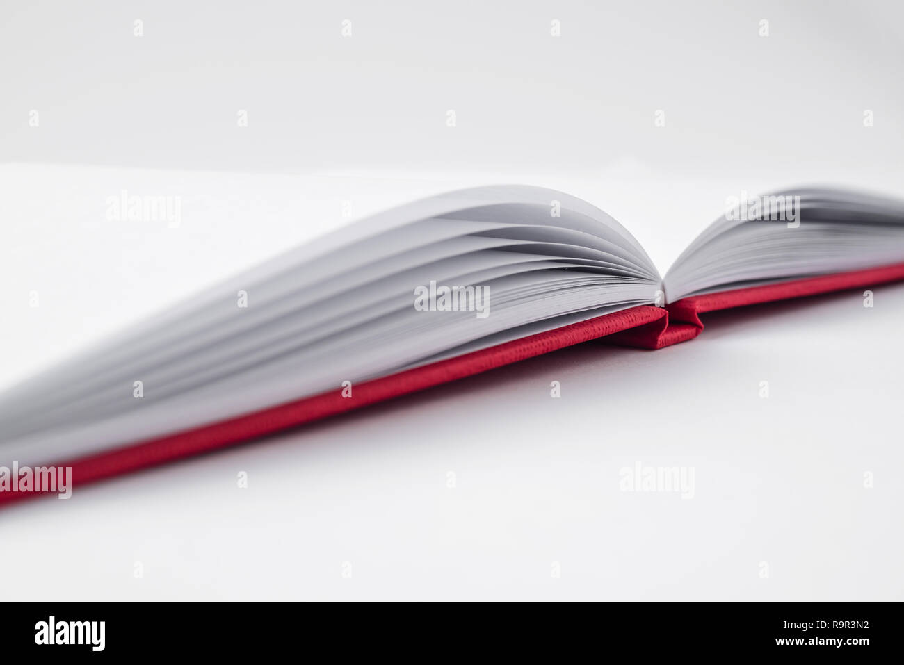 Design concept - Perspective view red hardcover notebook with open ...