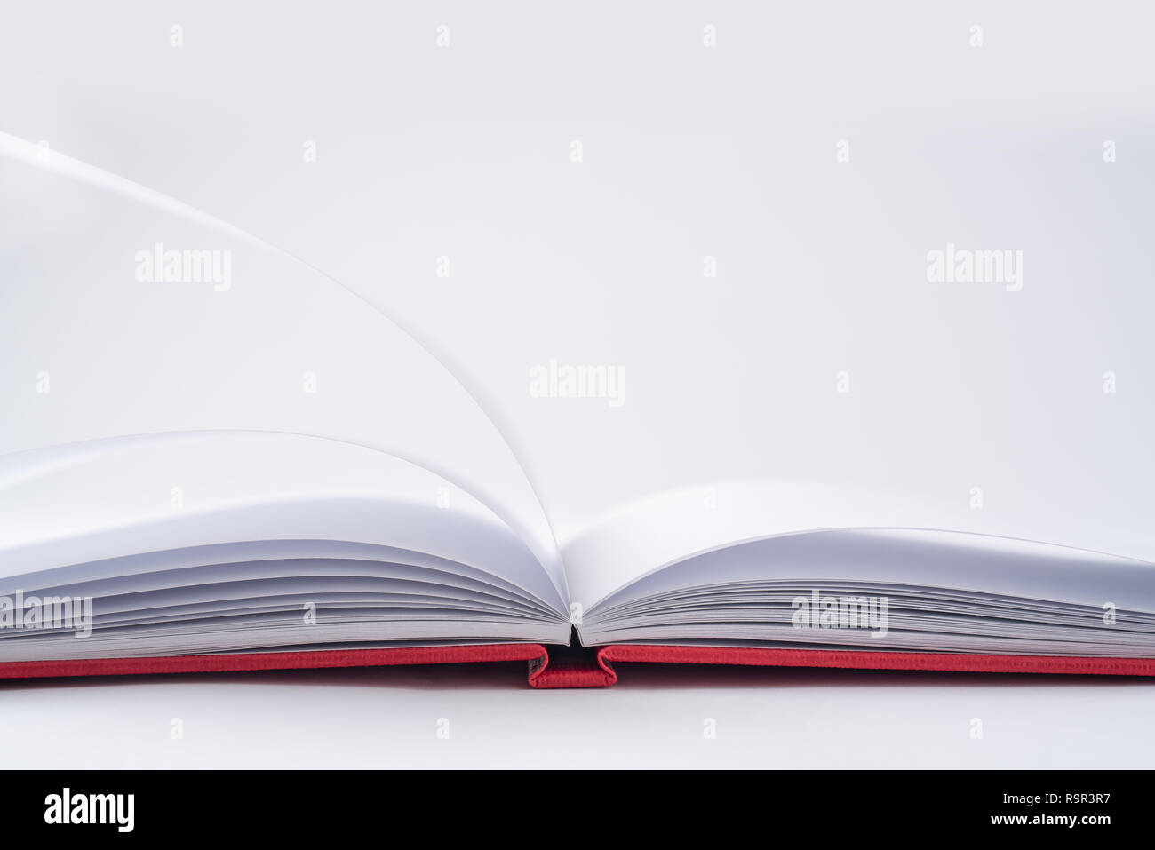 Design concept - Perspective view red hardcover notebook with open ...
